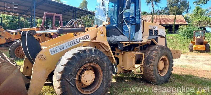 Leilão Online - [ VÍDEO ] PÁ CARREGADEIRA NEW HOLLAND MOD. W170 ANO