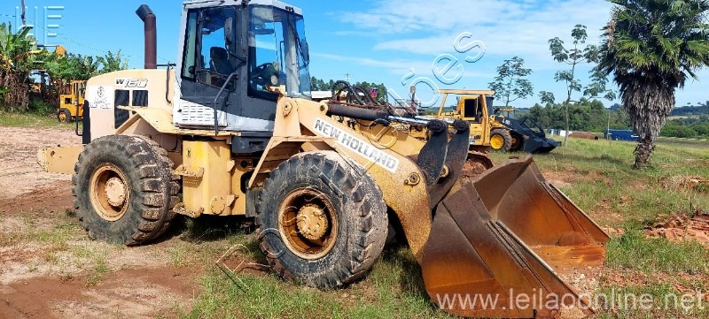 Leilão Online - [ VÍDEO ] PÁ CARREGADEIRA NEW HOLLAND MOD. W170 ANO