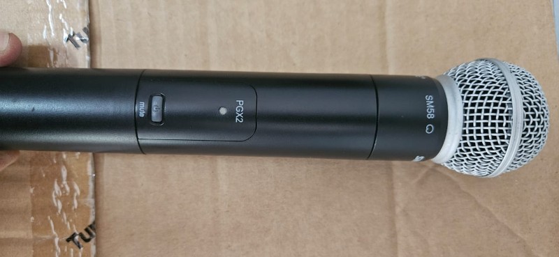 Leilão Online - MICROFONE SHURE; MOD. SM58 - PGX2. - NOVO. - LOC. S
