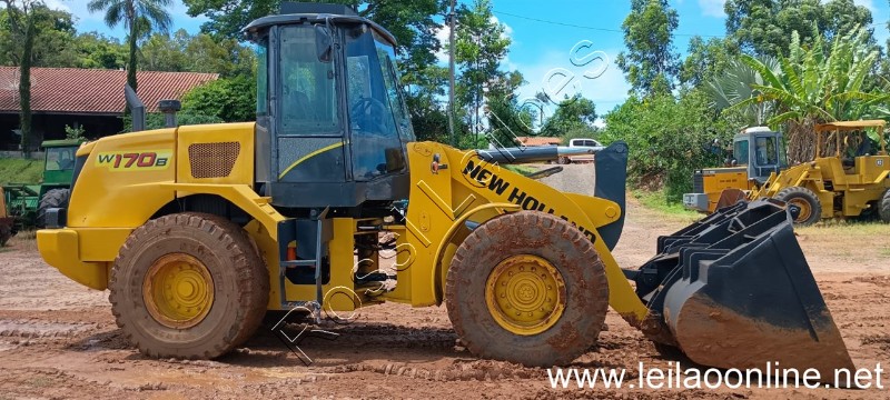 Leilão Online - [ VÍDEO ] PÁ CARREGADEIRA NEW HOLLAND MOD. W170 ANO