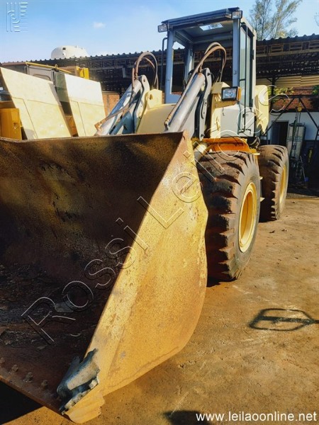 Leilão Online - PÁ CARREGADEIRA NEW HOLLAND W130 (NO ESTADO)